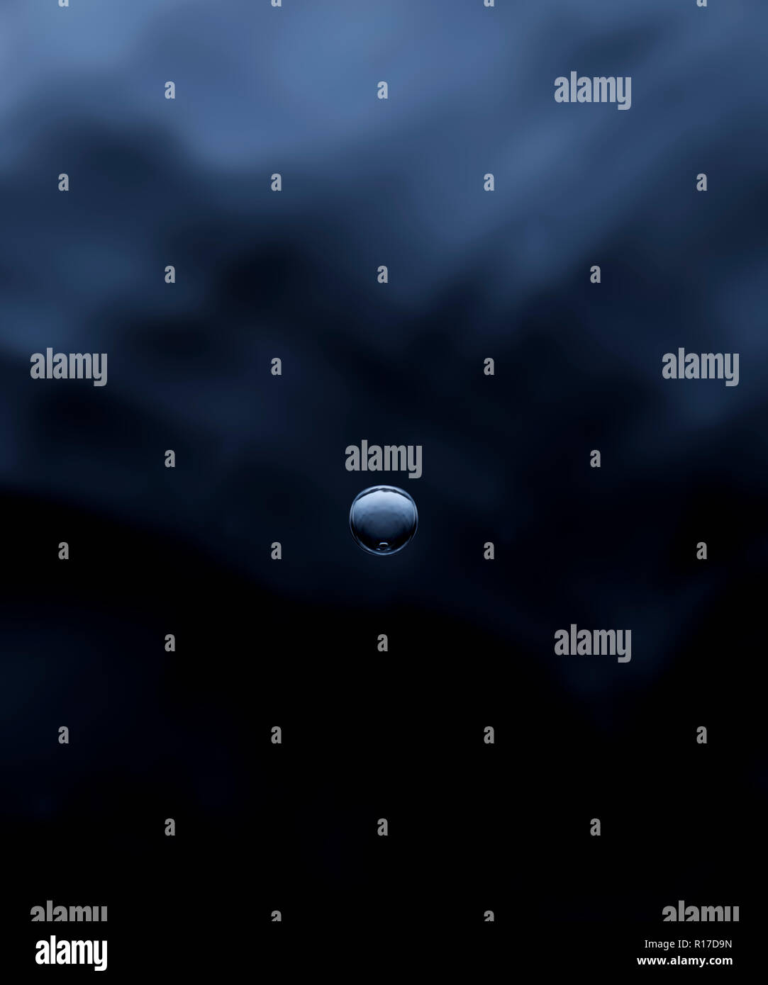 Air bubble on smooth dark water surface, detail Stock Photo - Alamy