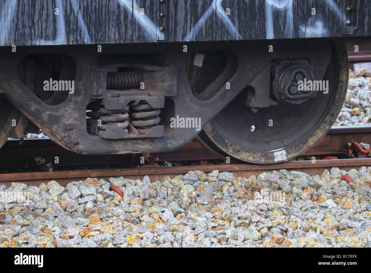 closeup wheel of a train on railroad at the station Stock Photo - Alamy