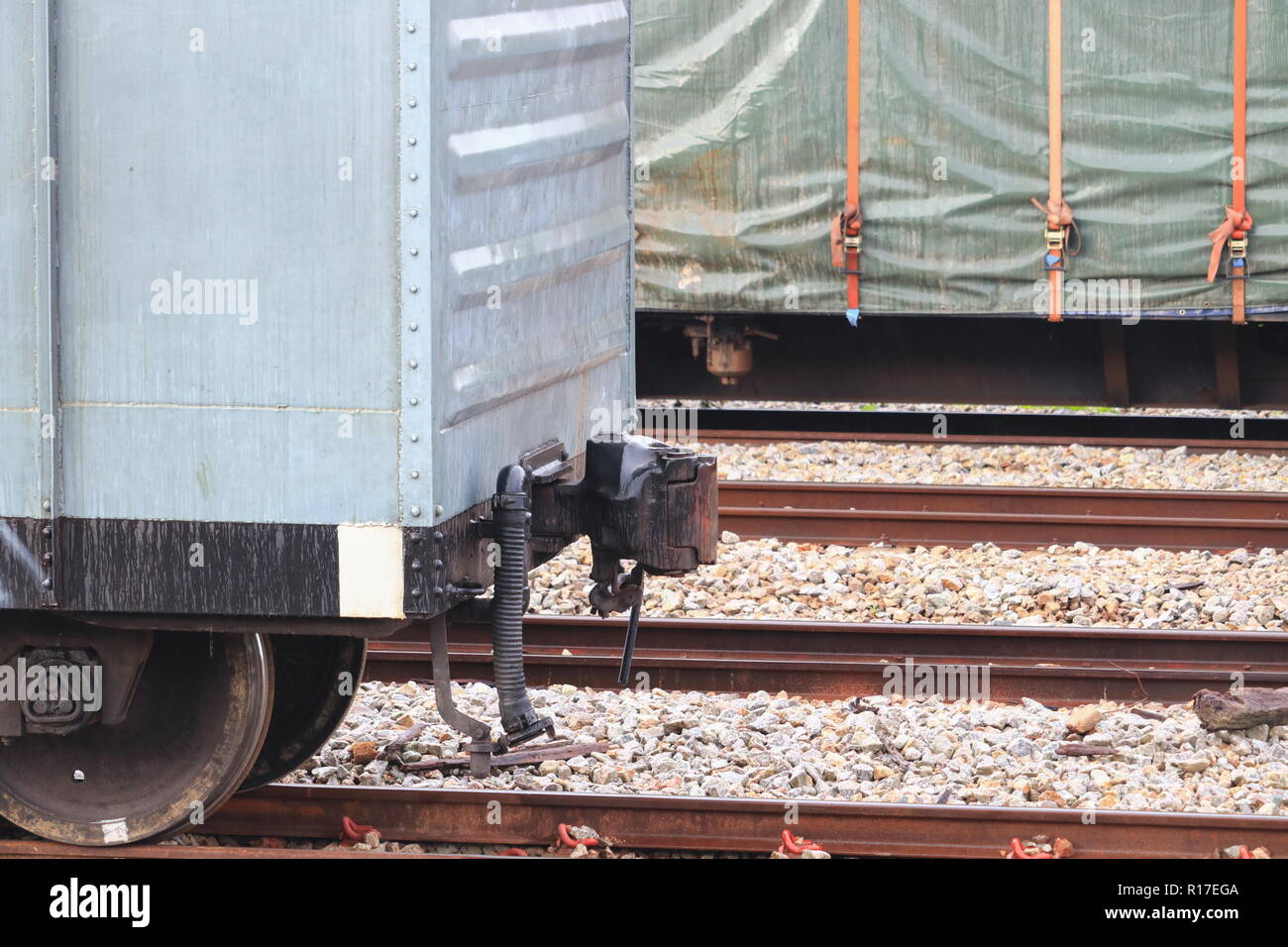 closeup joint of a train on railroad at the station Stock Photo - Alamy