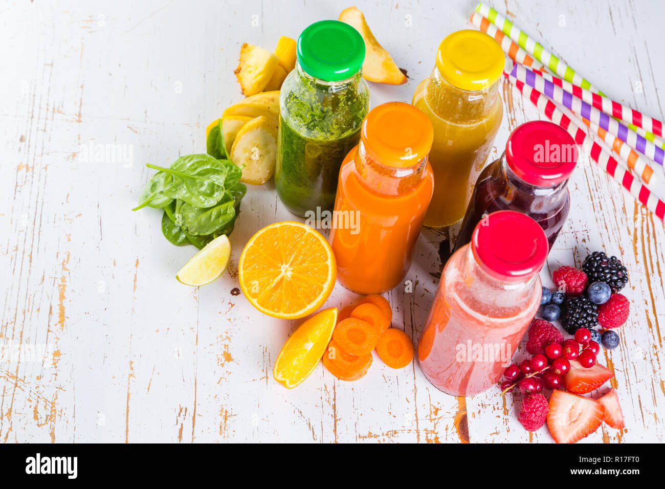 Selection of colourful smoothies on rustic wood background Stock Photo ...