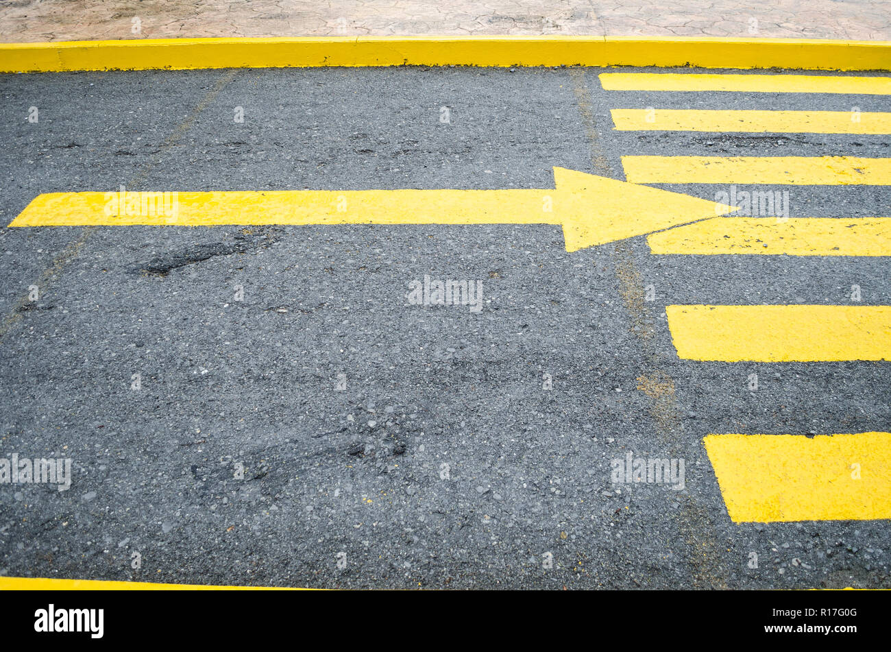 yellow arrow in the direction to the right, yellow pedestrian crossing ...