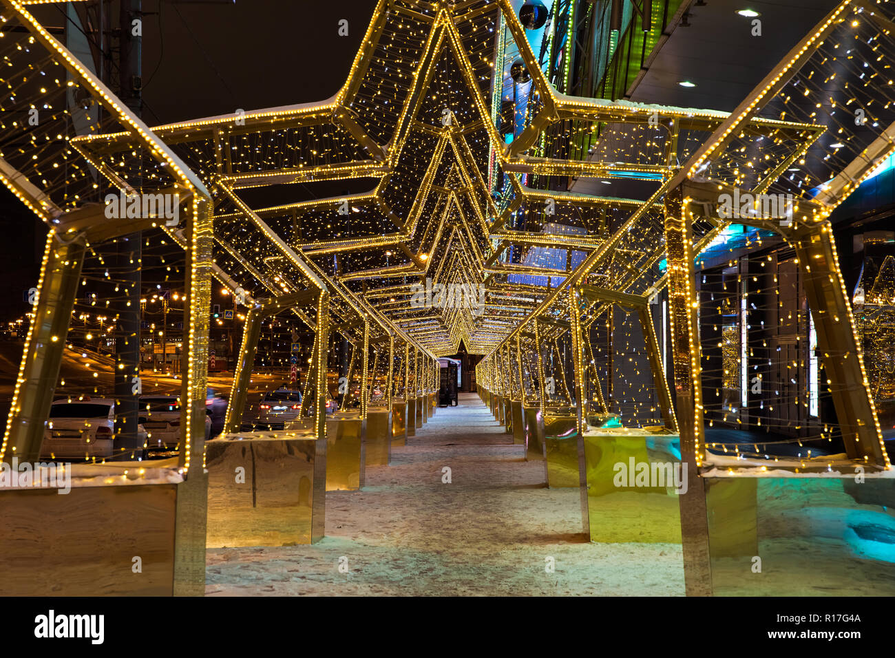 Light star glowing tunnel on the street of Moscow, New Year and ...