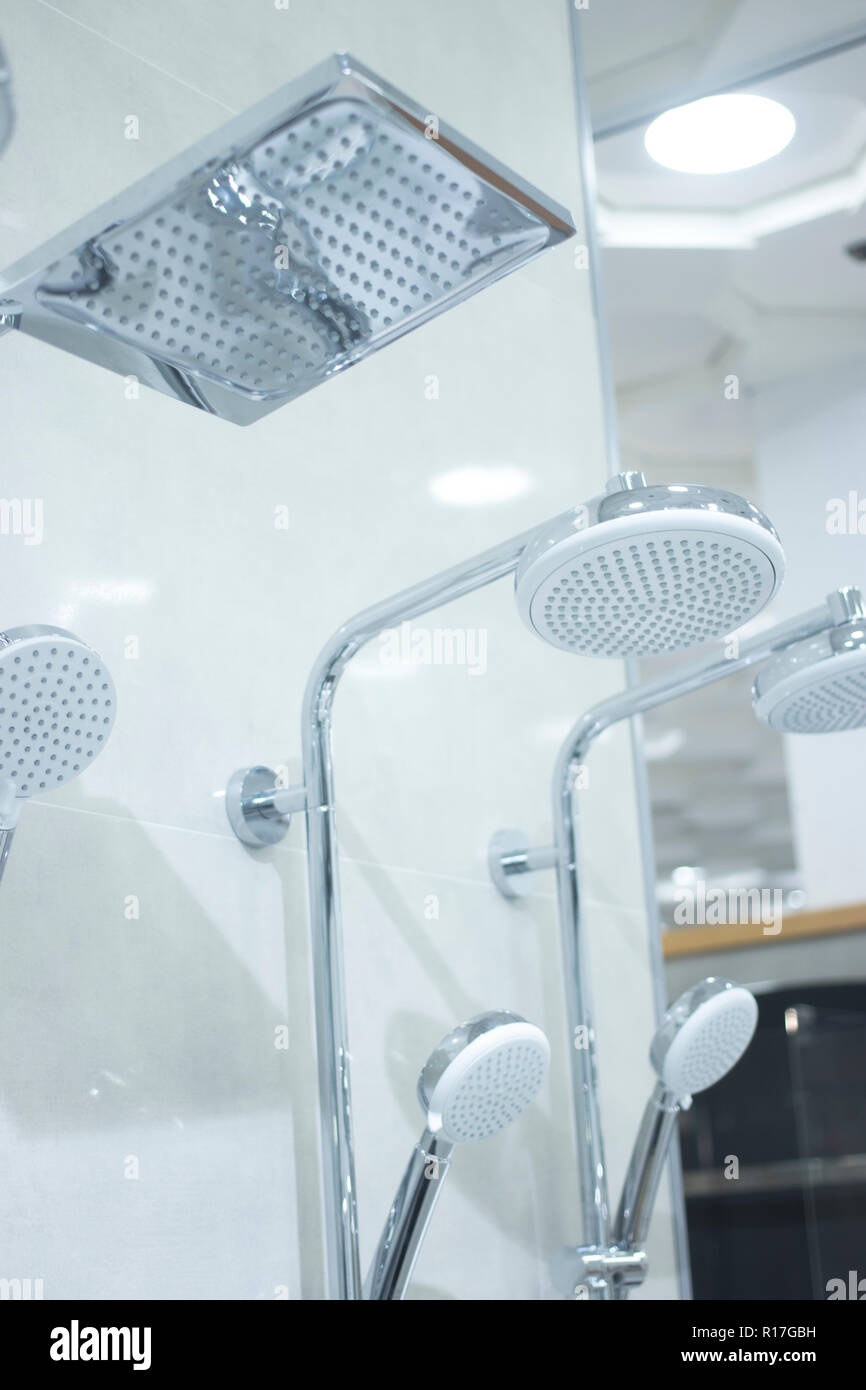 Bathroom chrome shower head showroom display of new design option for ...