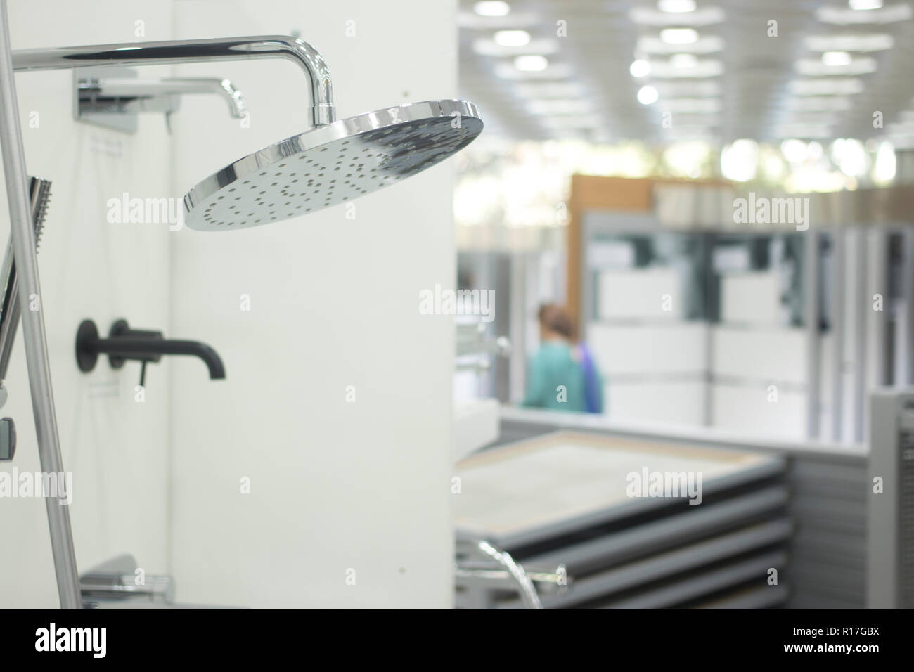 Bathroom chrome shower head showroom display of new design option for ...