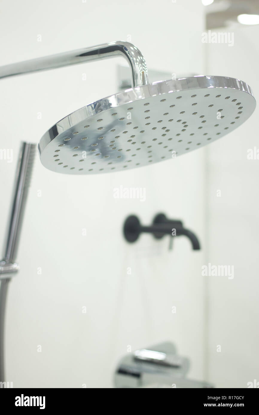 Bathroom chrome shower head showroom display of new design option for ...