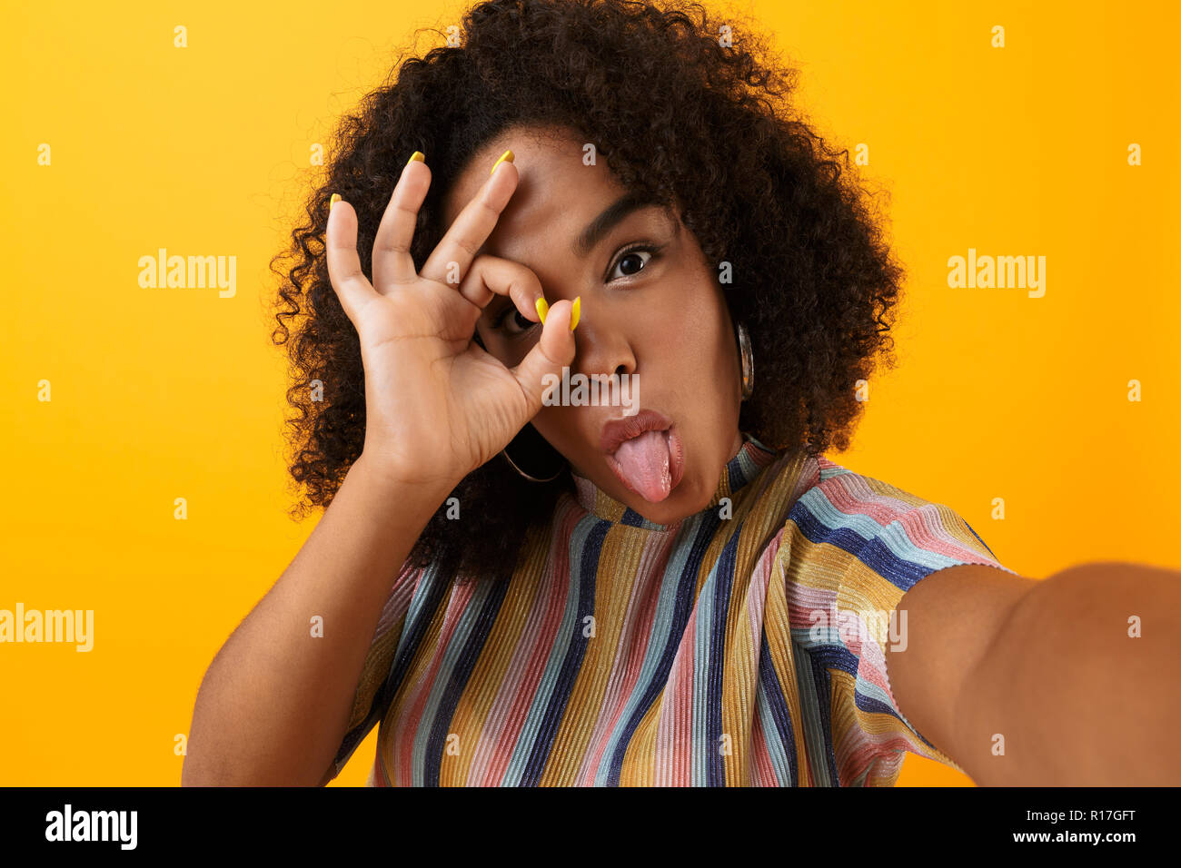 Image of beautiful young happy african cute girl posing isolated over ...