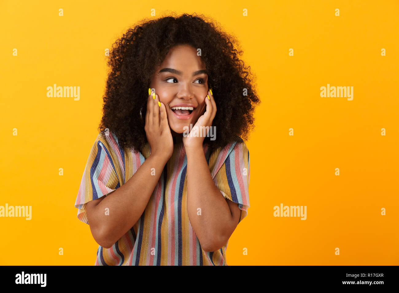 Image of happy young african cute girl posing isolated over yellow ...