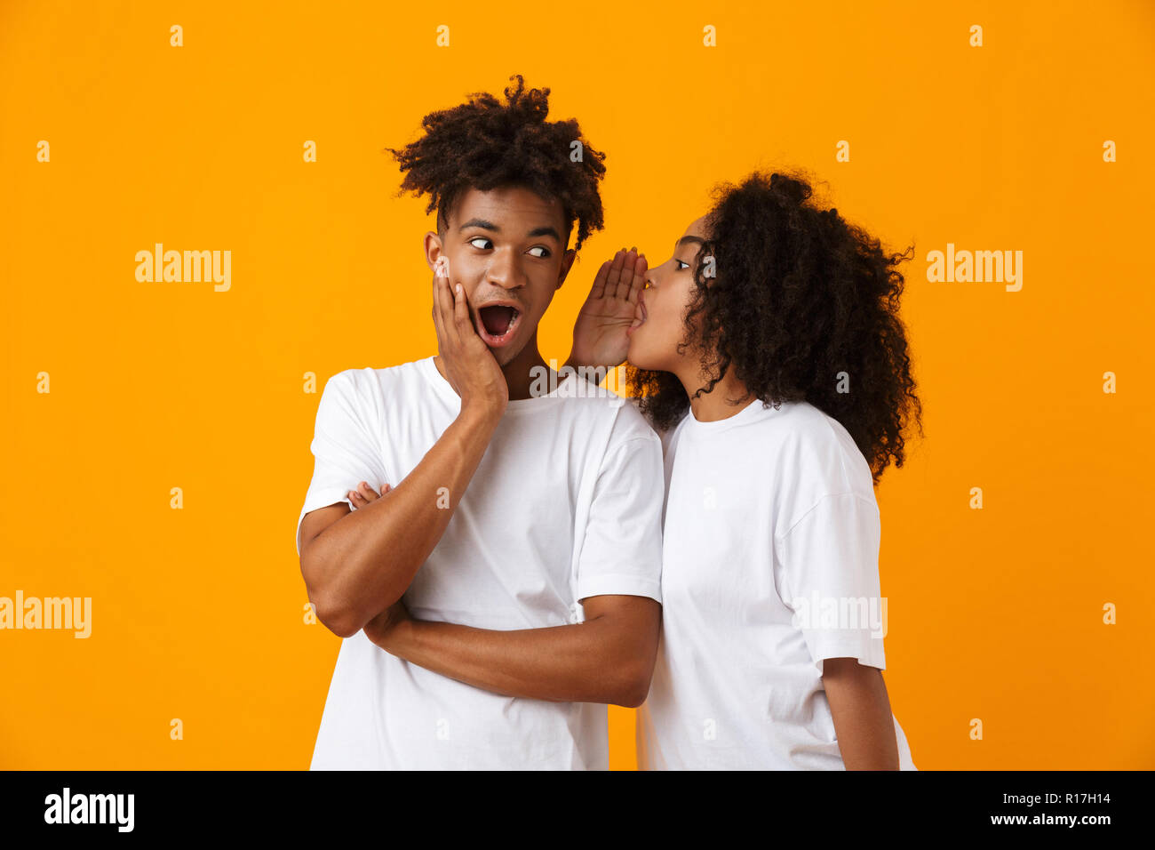 Image of emotional young cute african couple posing isolated over ...