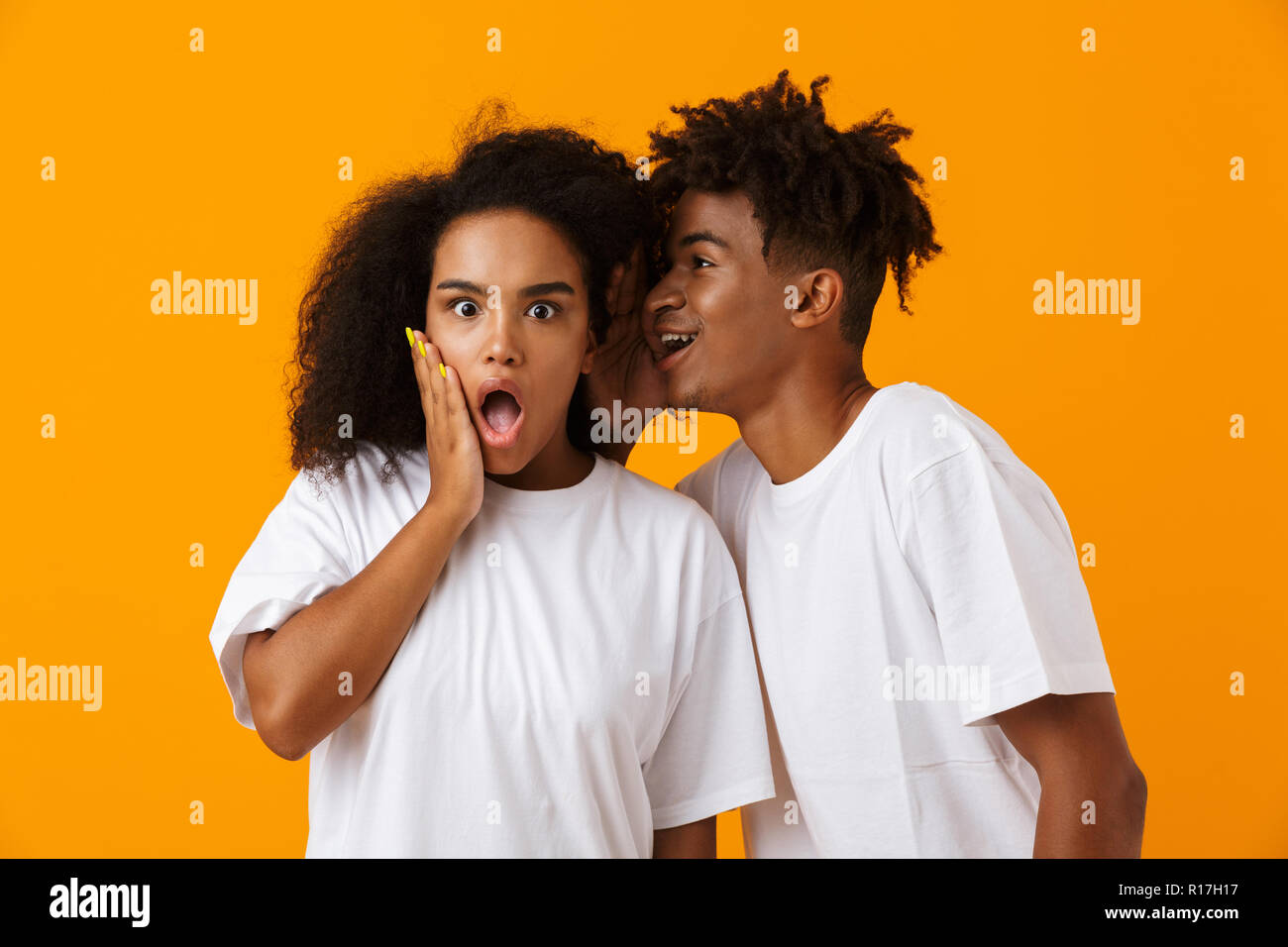 Image of emotional young cute african couple posing isolated over ...