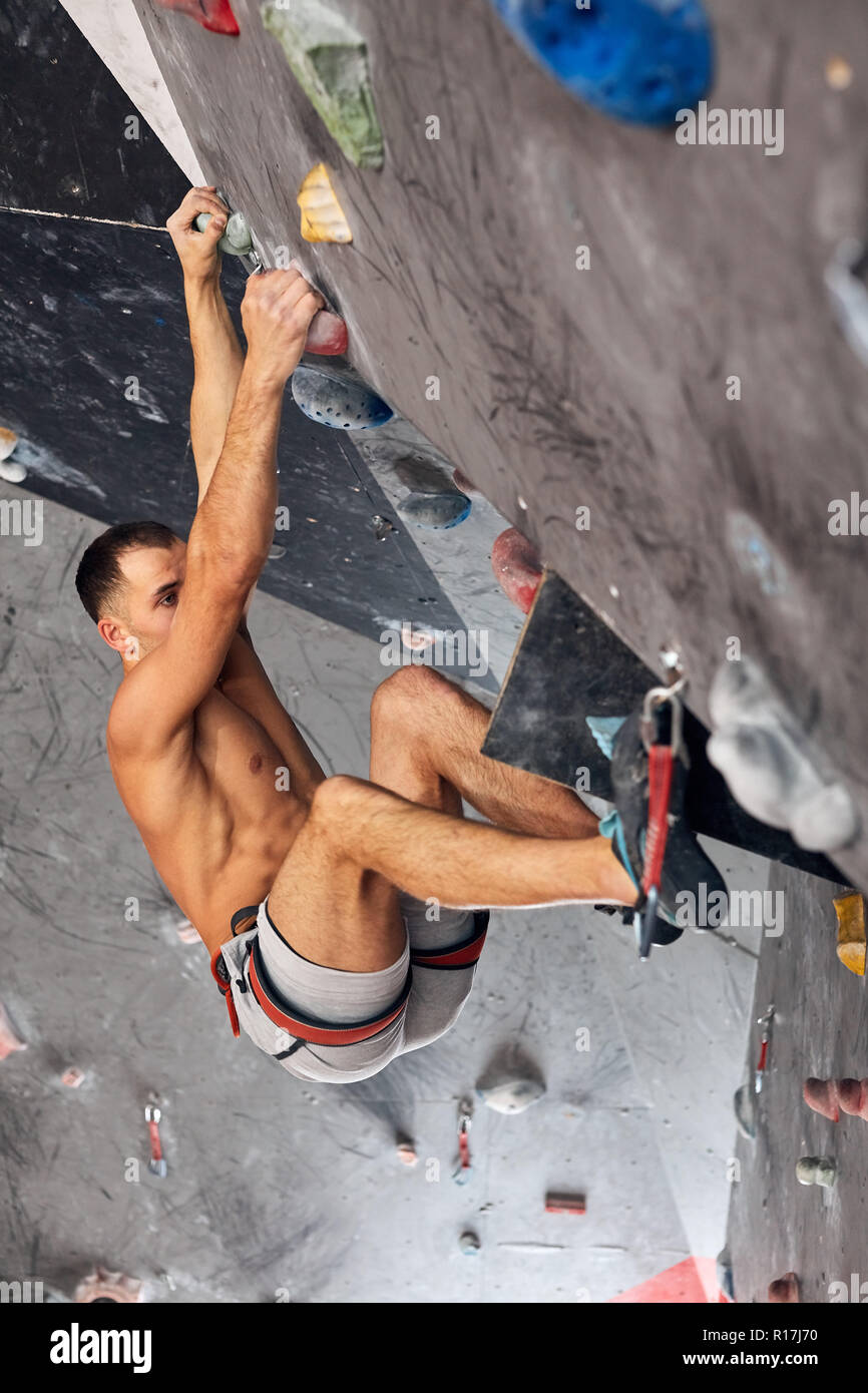 Professional male climber bouldering hi-res stock photography and ...