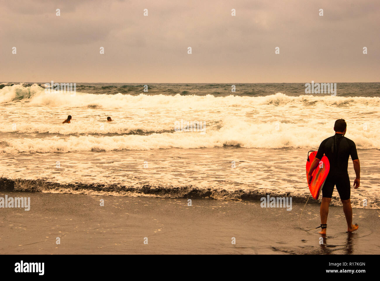 Gold sea with surfer hi-res stock photography and images - Alamy