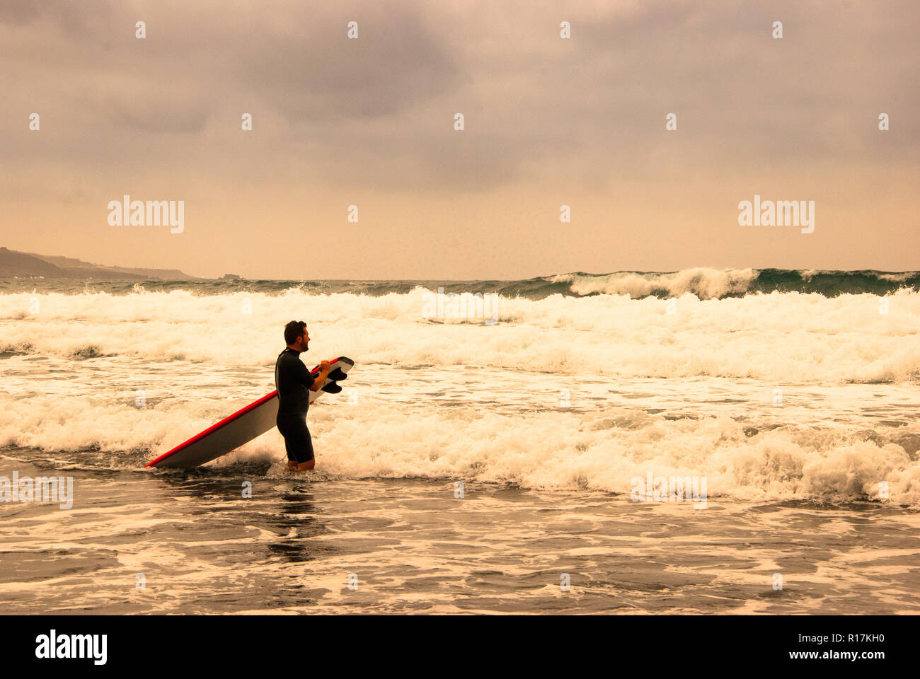 Female with surf board hi-res stock photography and images - Alamy