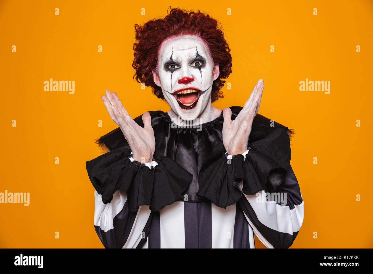 Man looking at clown costume hi-res stock photography and images - Alamy