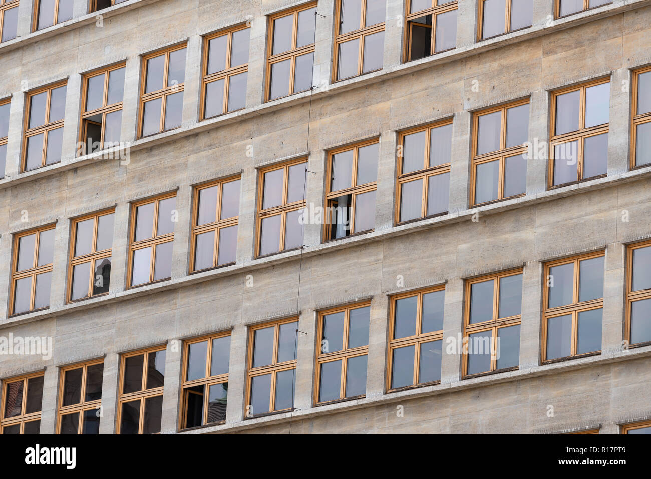 old facade with many windows Stock Photo - Alamy