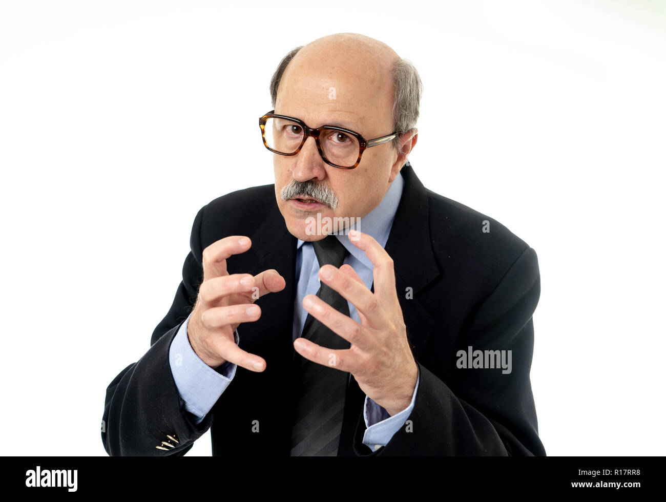 60s senior businessman boss furious with angry face and gesturing upset ...