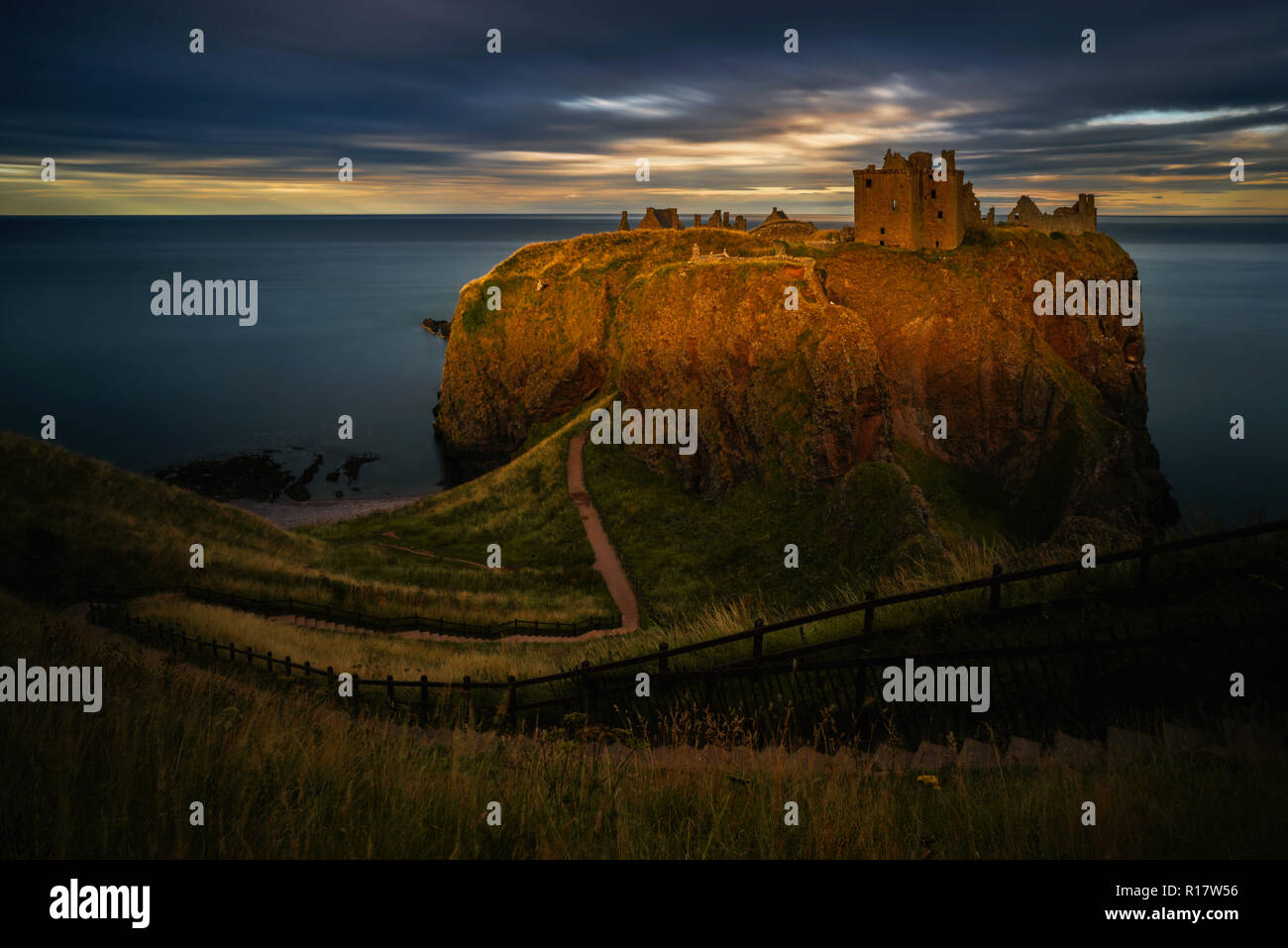 Dunnottar Castle on high cliffs in sunset, Scotland Stock Photo - Alamy