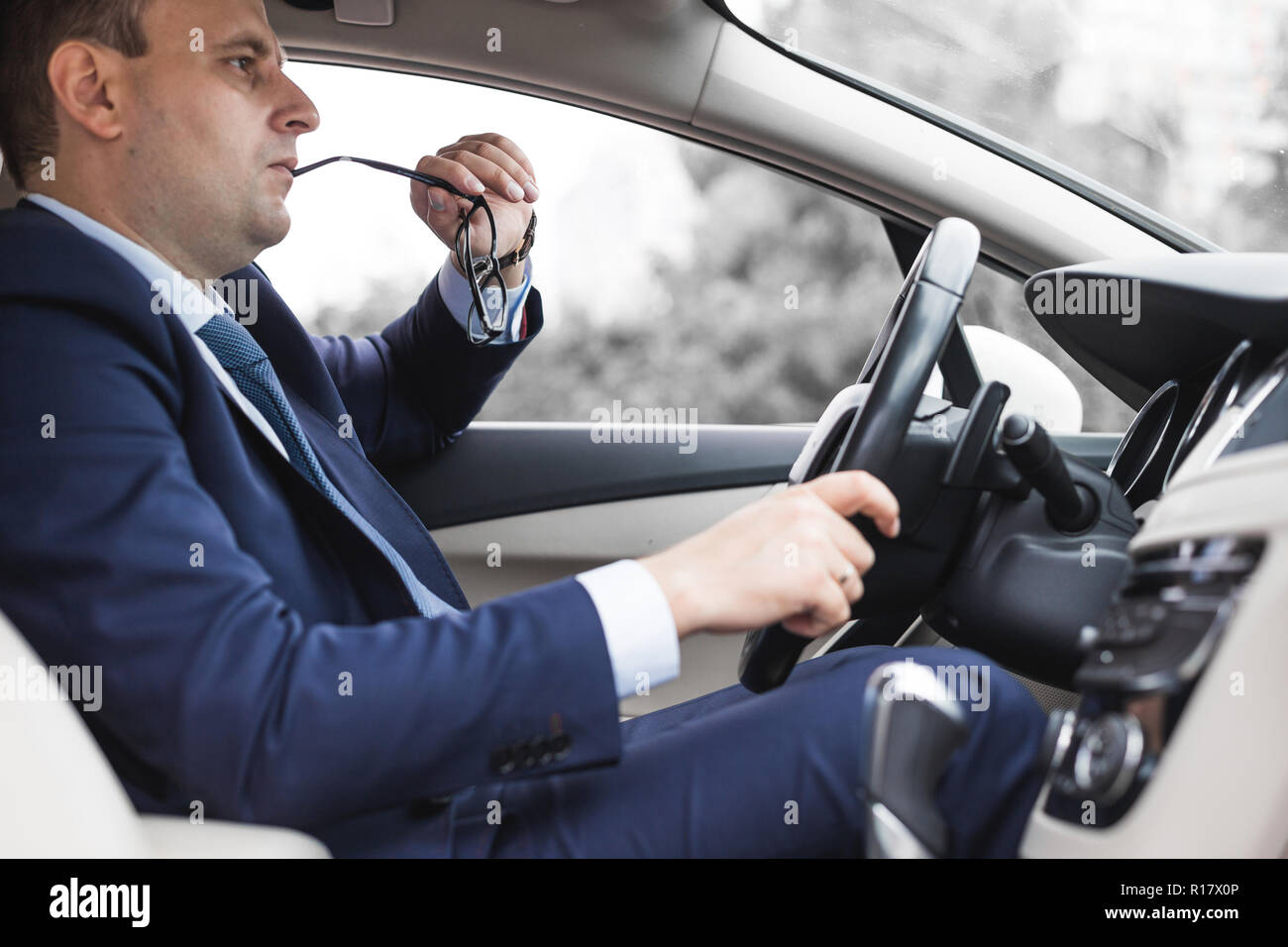 Man holds on driving inside hi-res stock photography and images - Alamy