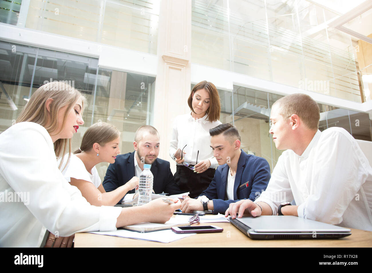 Group of business meeting at the table in the modern office of an ...