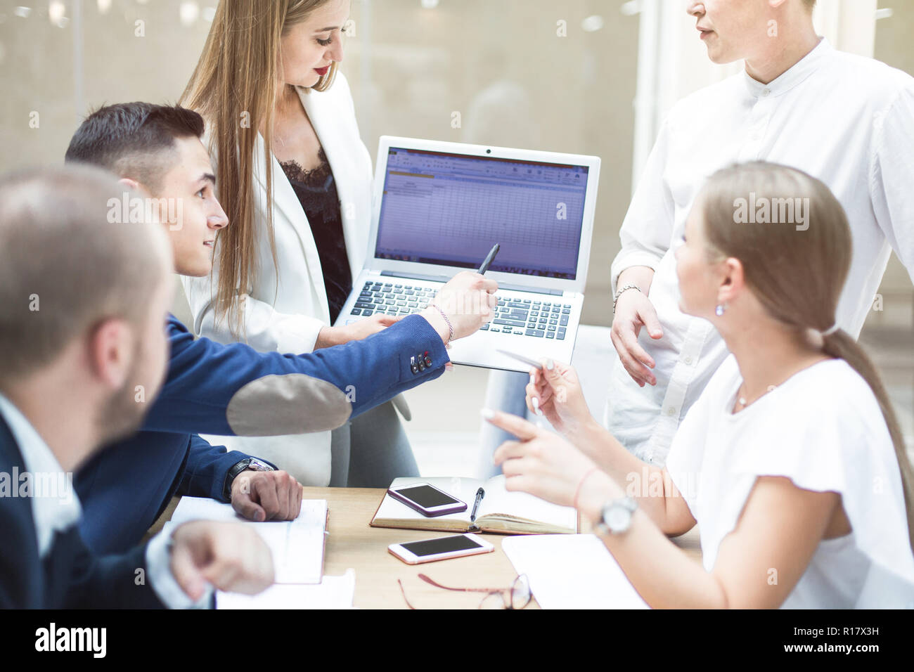 Group of business meeting at the table in the modern office of an ...