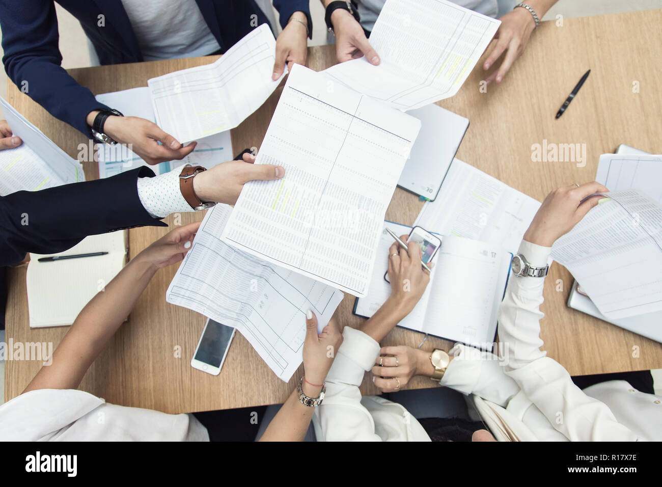 Group of business meeting at the table in the modern office of an ...