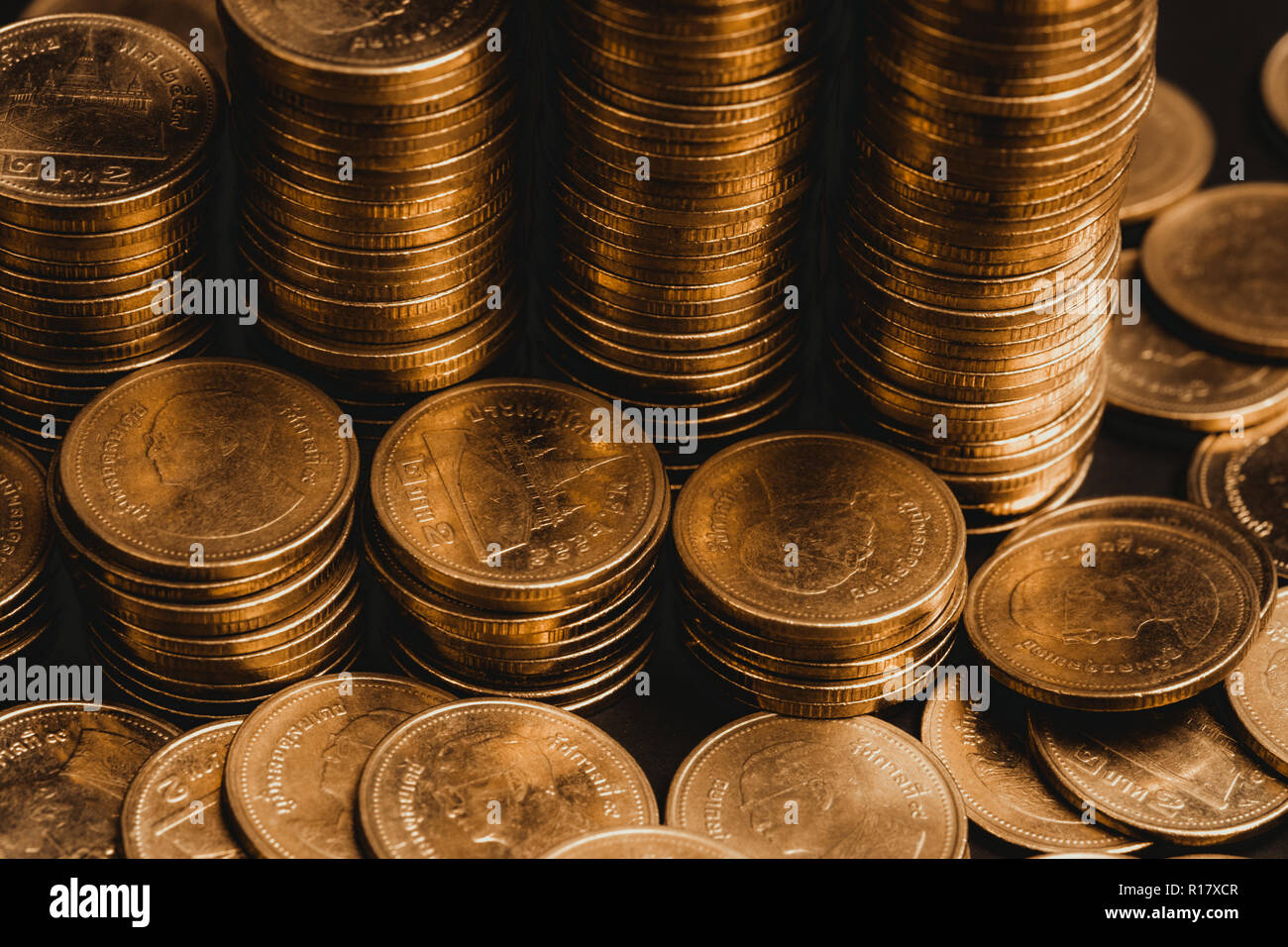 Savings, increasing columns of coins, piles of coins arranged as a ...