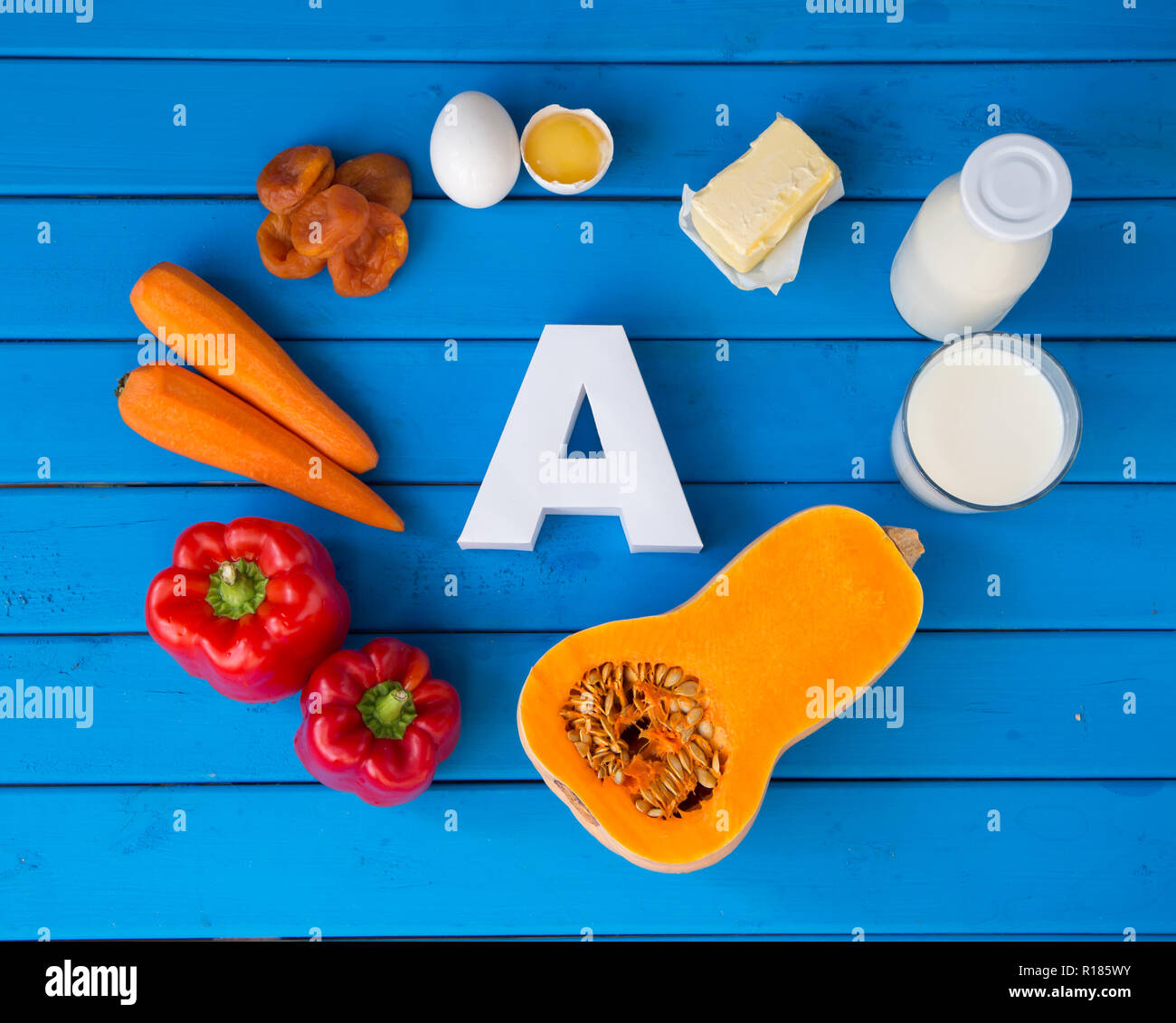 Food sources of natural vitamin A and letter A. Top view. Healthy life ...
