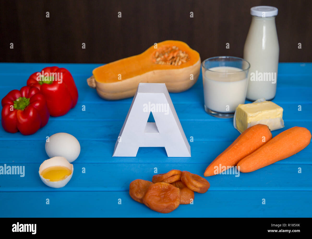 Food sources of natural vitamin A and letter A. Front view. Healthy ...