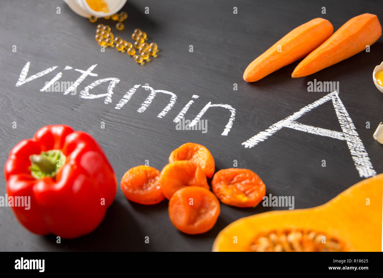 Food sources of natural vitamin A. Top view. Healthy life concept Stock ...