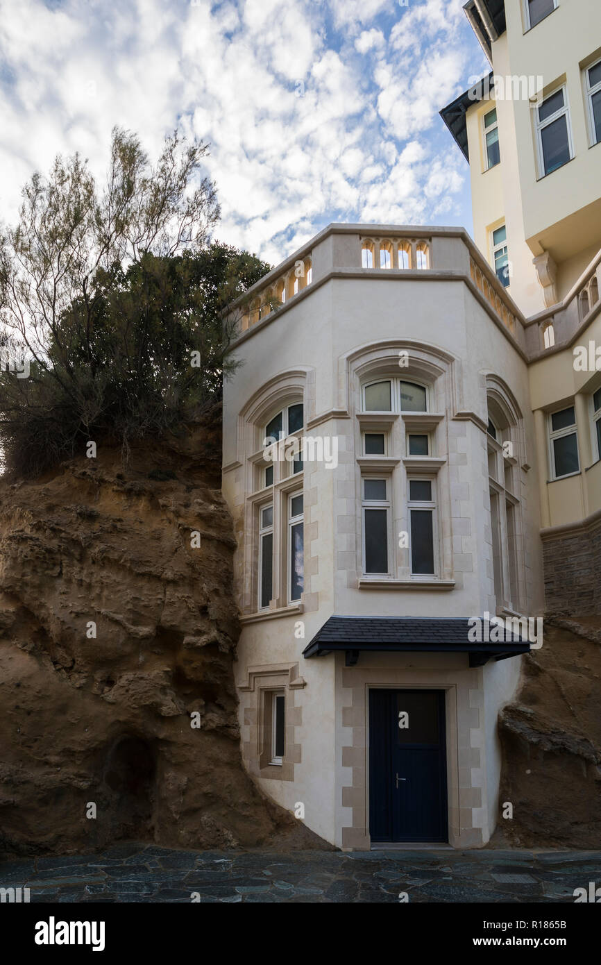 Where property meets nature - property built into the rock Stock Photo ...