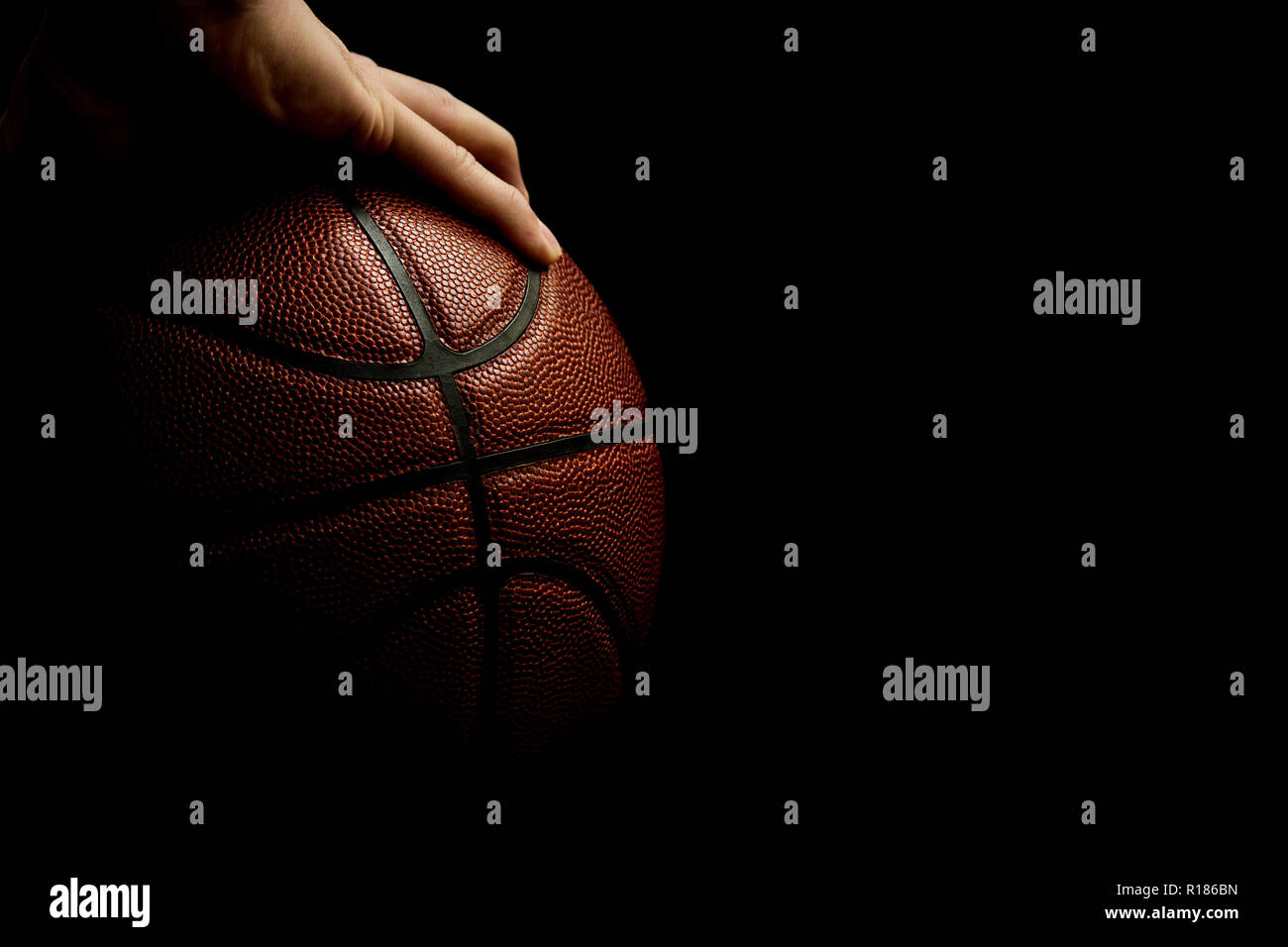 Palming basketball hi-res stock photography and images - Alamy