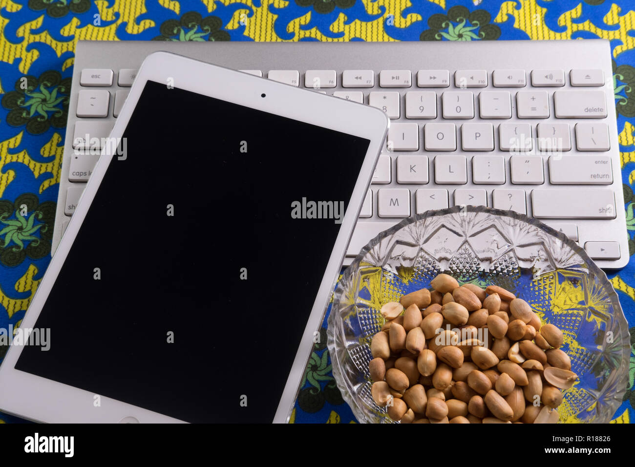 Tablet, keyboard on Ankara Fabric Stock Photo - Alamy