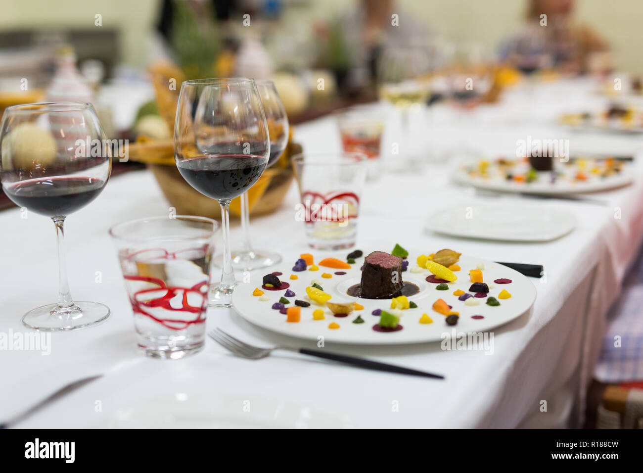 Luxury dinner with beef with red caviar and ginger croutons and ...