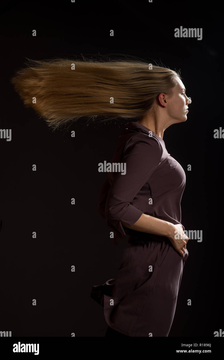 Caucasian White Female Model Portrait The Wind Blowing The Long Blonde