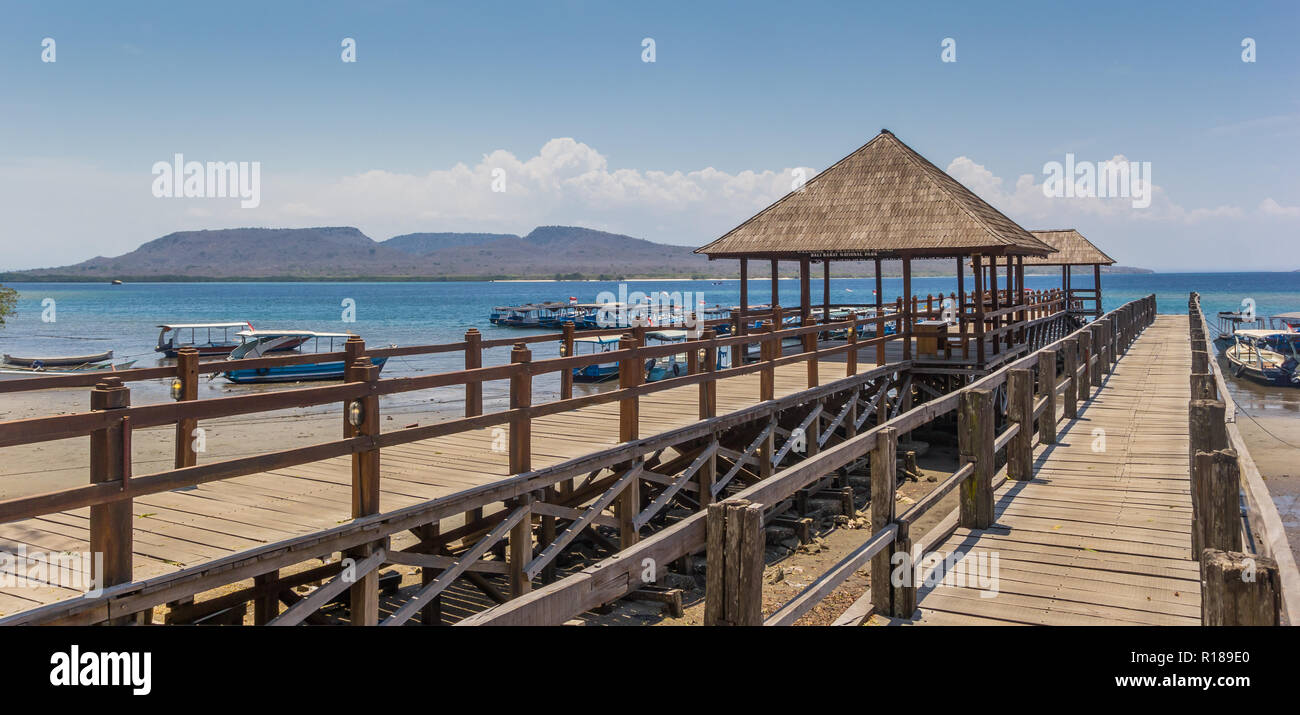 Panorama of a wooden jetty at the Bali Barat National Park, Indonesia ...