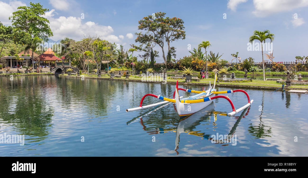 Panorama of a traditional Balinese fishing boat in the pond of the ...