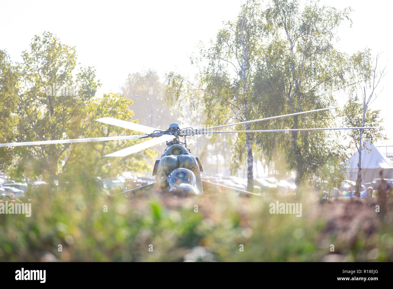 Military helicopter lands on the ground during Military Exercise Stock ...