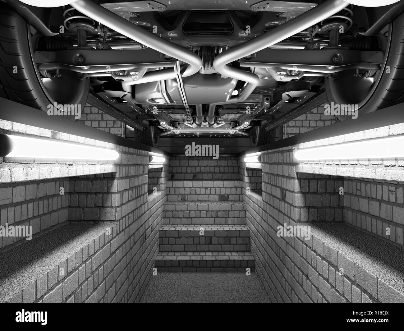 concept of car service car view from below from the pit of the garage ...
