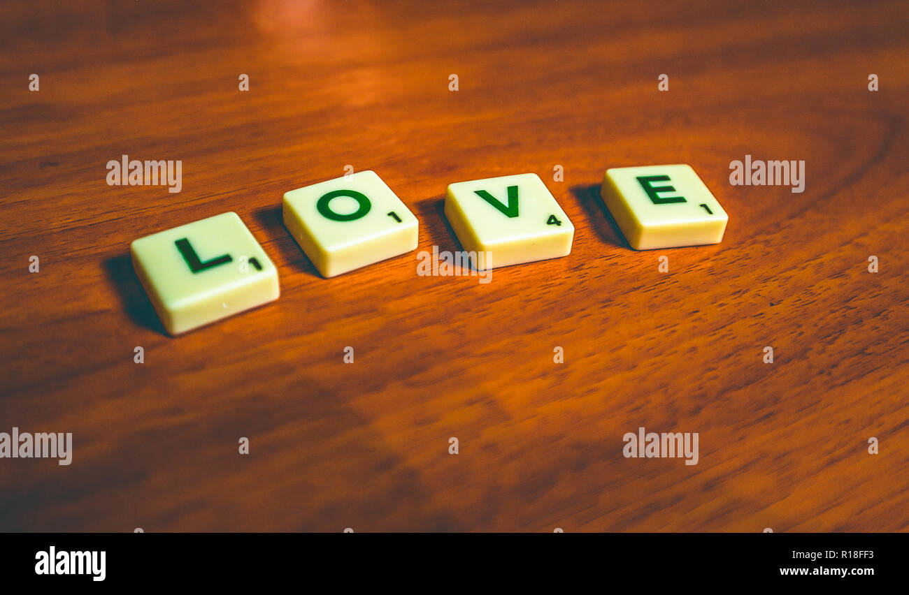 Love in scrabble letters hi-res stock photography and images - Alamy