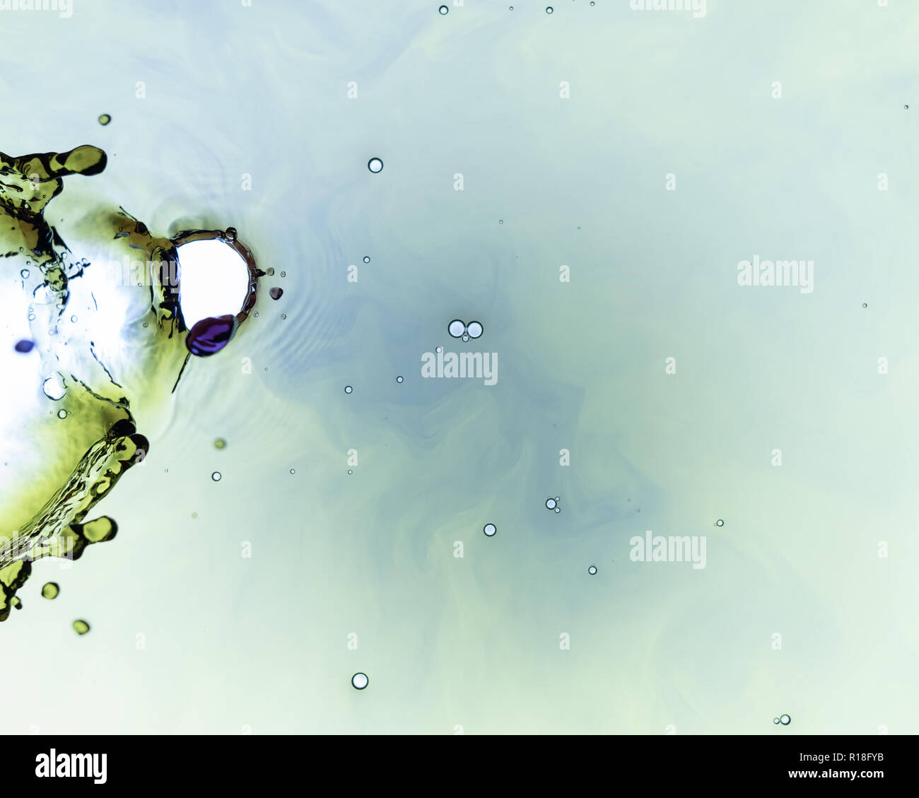 Colored Water Splash overhead view abstract background Stock Photo - Alamy