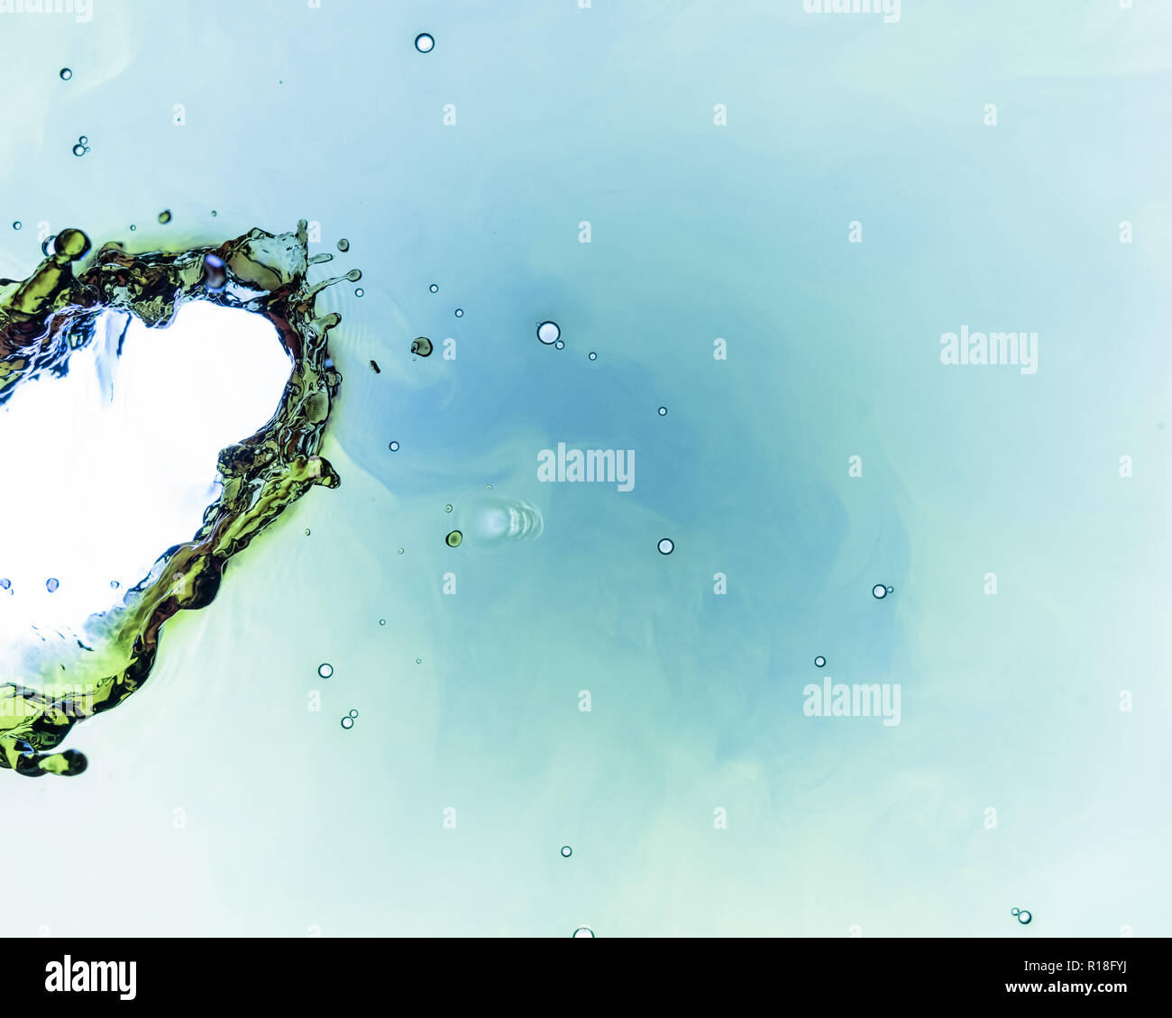 Colored Water Splash overhead view abstract background Stock Photo - Alamy