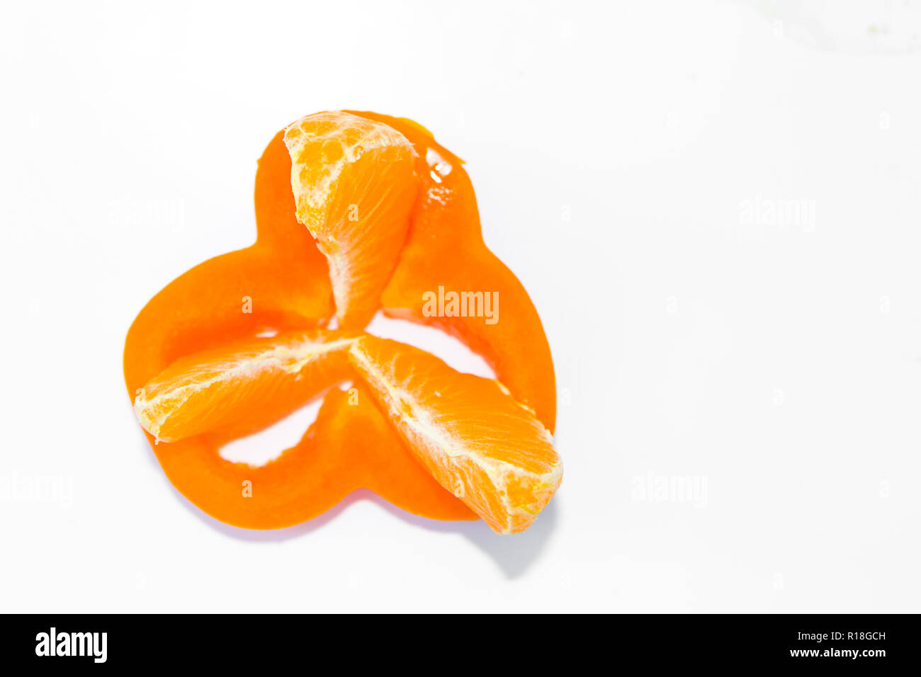 top view sliced pepper and mandarin isolated on white background Stock ...
