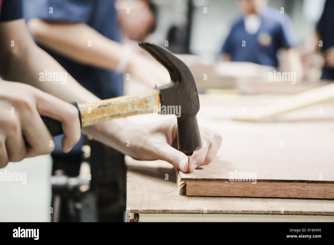 Thai Engineering Student hit a nail using hammer in engineering ...