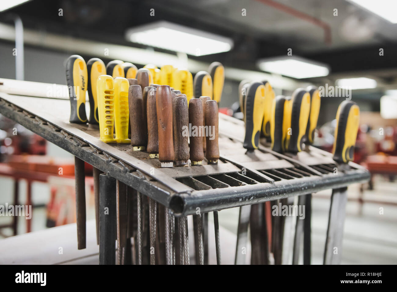 Bunch of metal file with three different sizes stored on a metallic ...