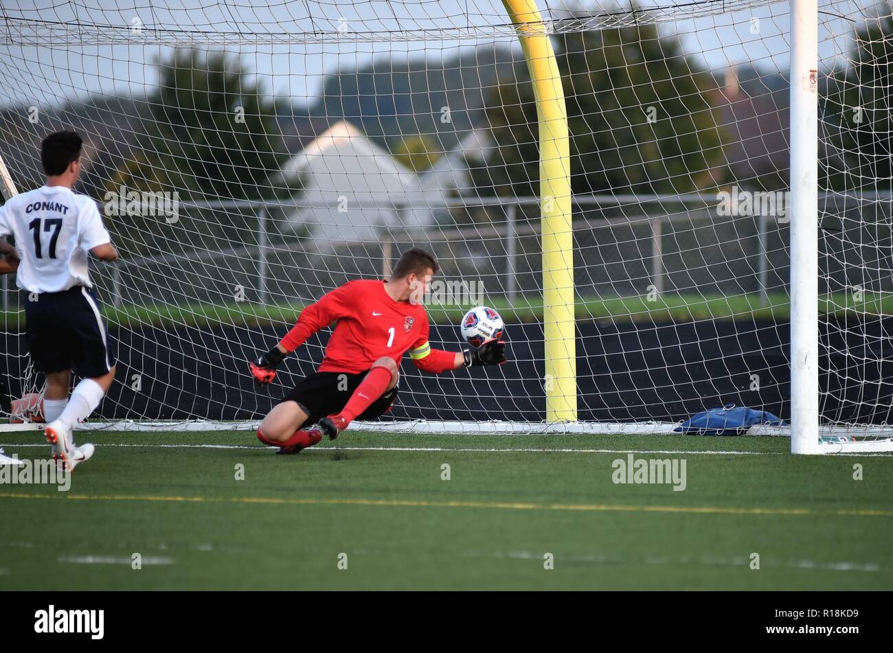 Keeper unable to stop a deflected shot for a goal. USA Stock Photo - Alamy