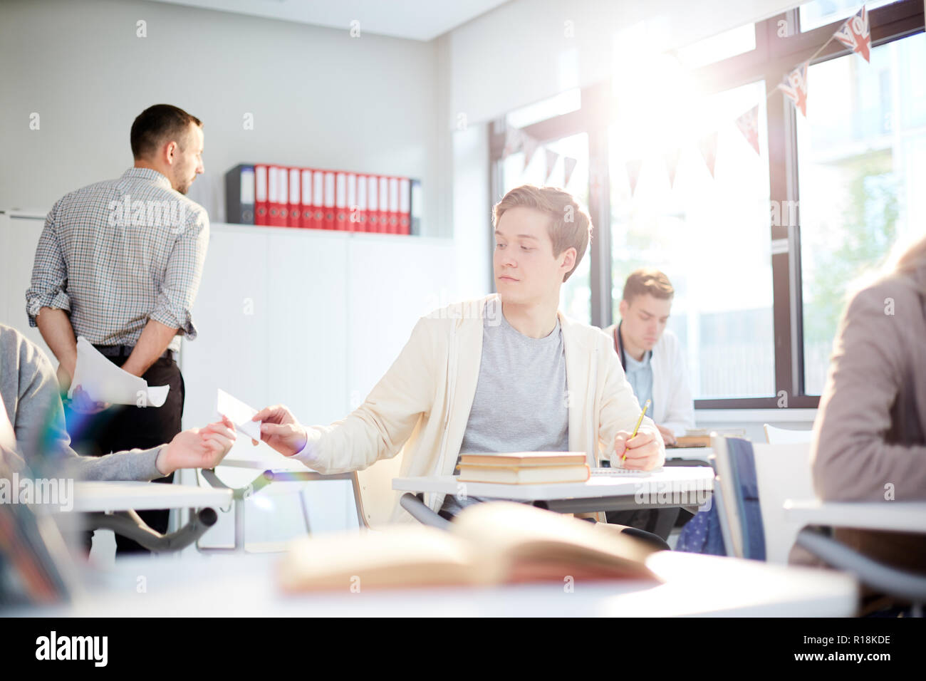 Passing note hi-res stock photography and images - Alamy