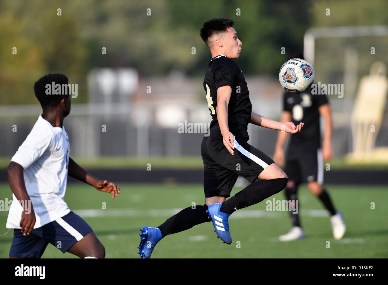 Teens Playing Football High Resolution Stock Photography and Images - Alamy
