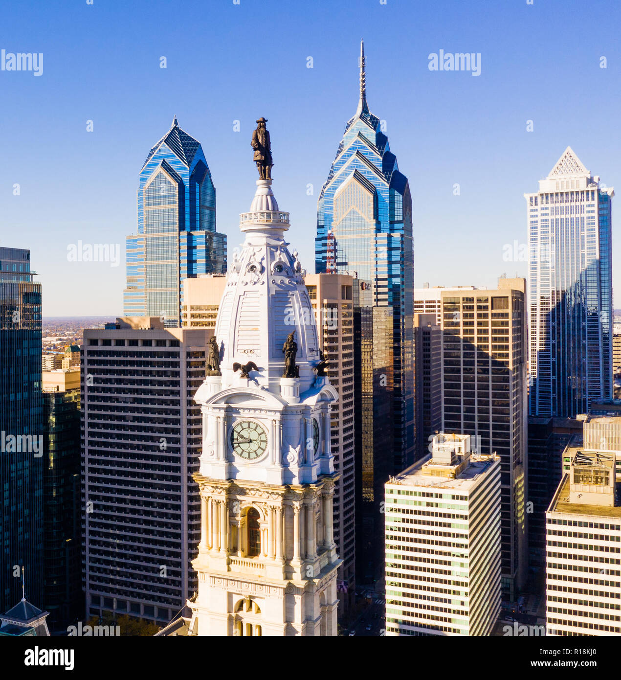 Statue of Ben Franklin looks over the city streets of Philadelphia PA ...
