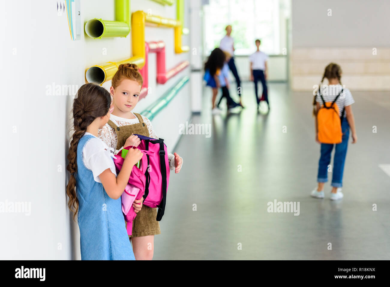 Two schoolgirls chatting hi-res stock photography and images - Alamy