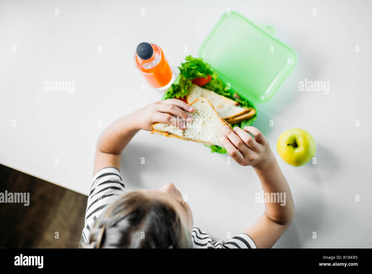 Child eating lettuce sandwich hi-res stock photography and images - Alamy