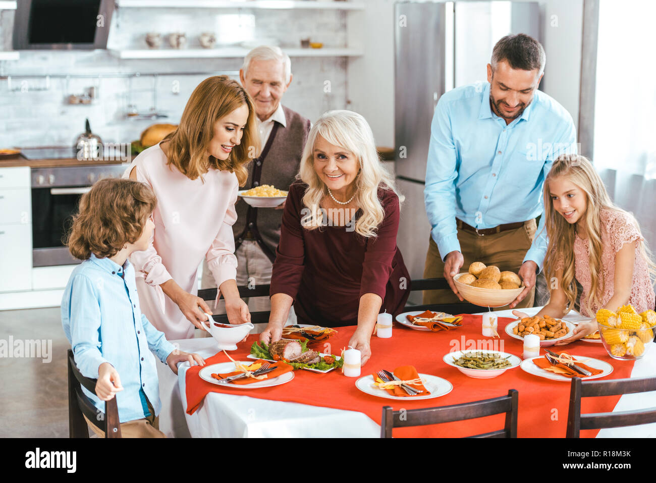 happy family serving table together at home during thansgiving Stock ...